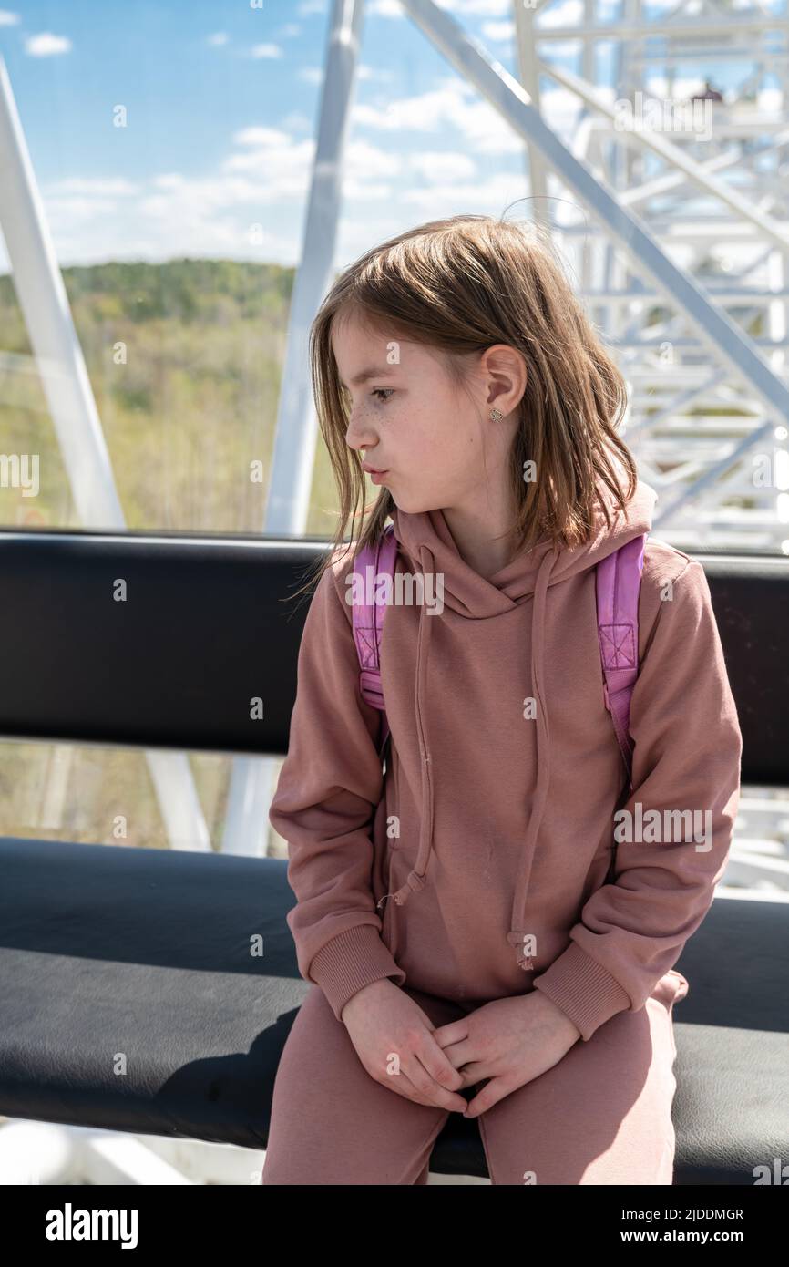 cute girl child in a booth on a Ferris wheel Stock Photo - Alamy