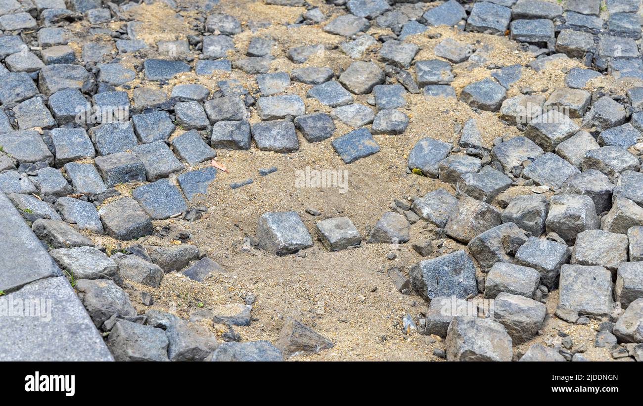 Damaged Cobblestones Street Sinking Hole Filled With Sand Danger Stock ...