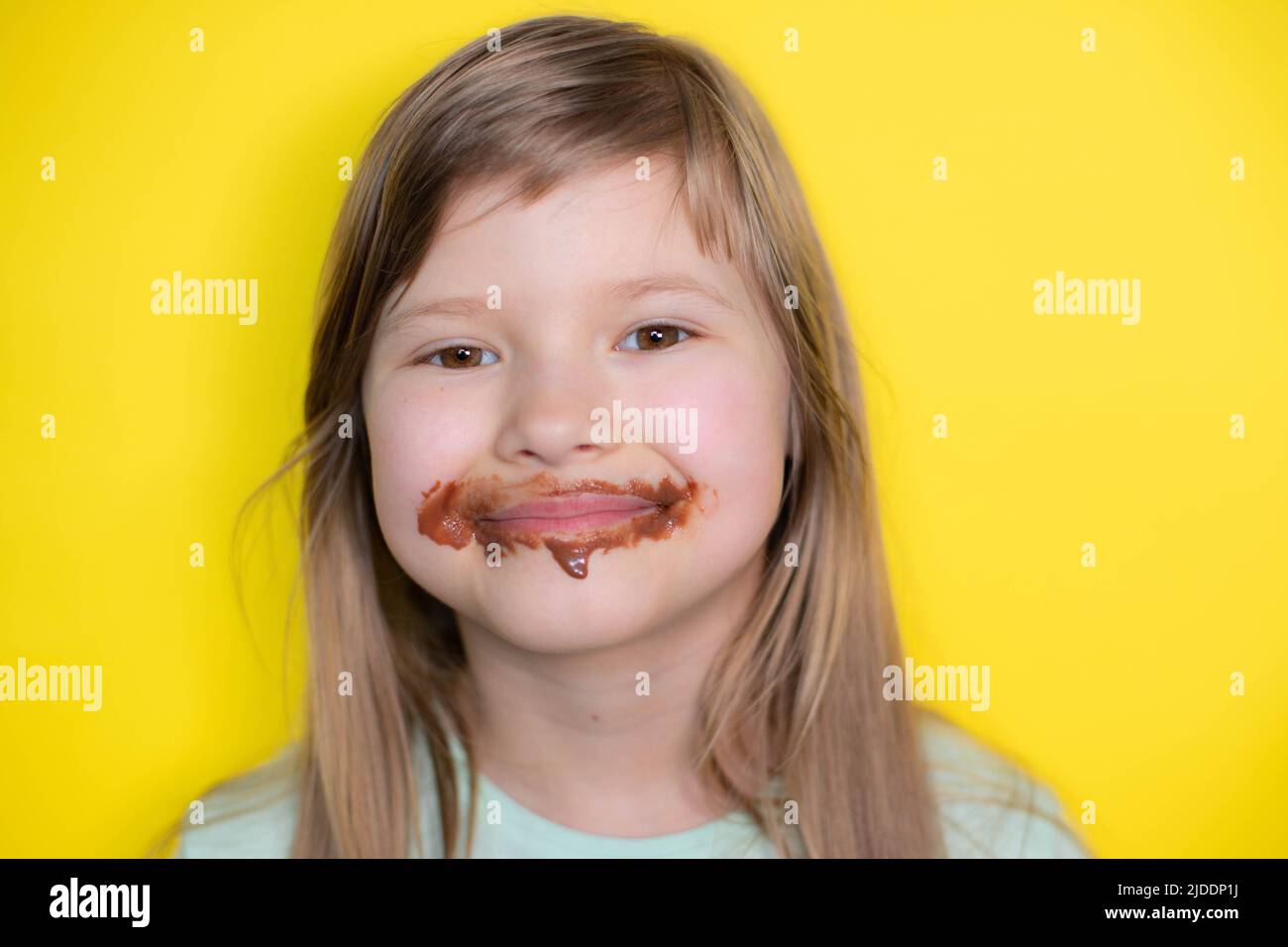 Small girl chocolate hi-res stock photography and images - Alamy