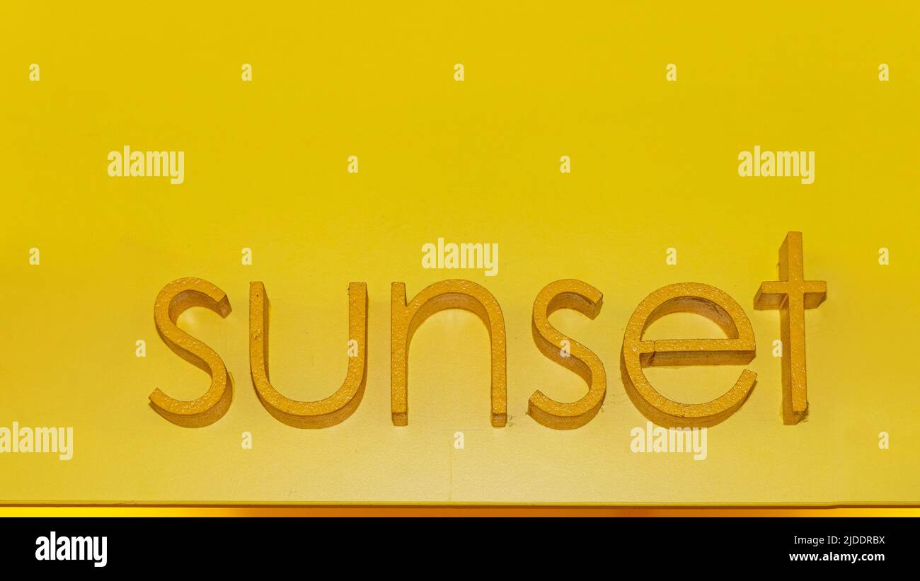 3d Letters Sunset Sign at Yellow Background Stock Photo - Alamy