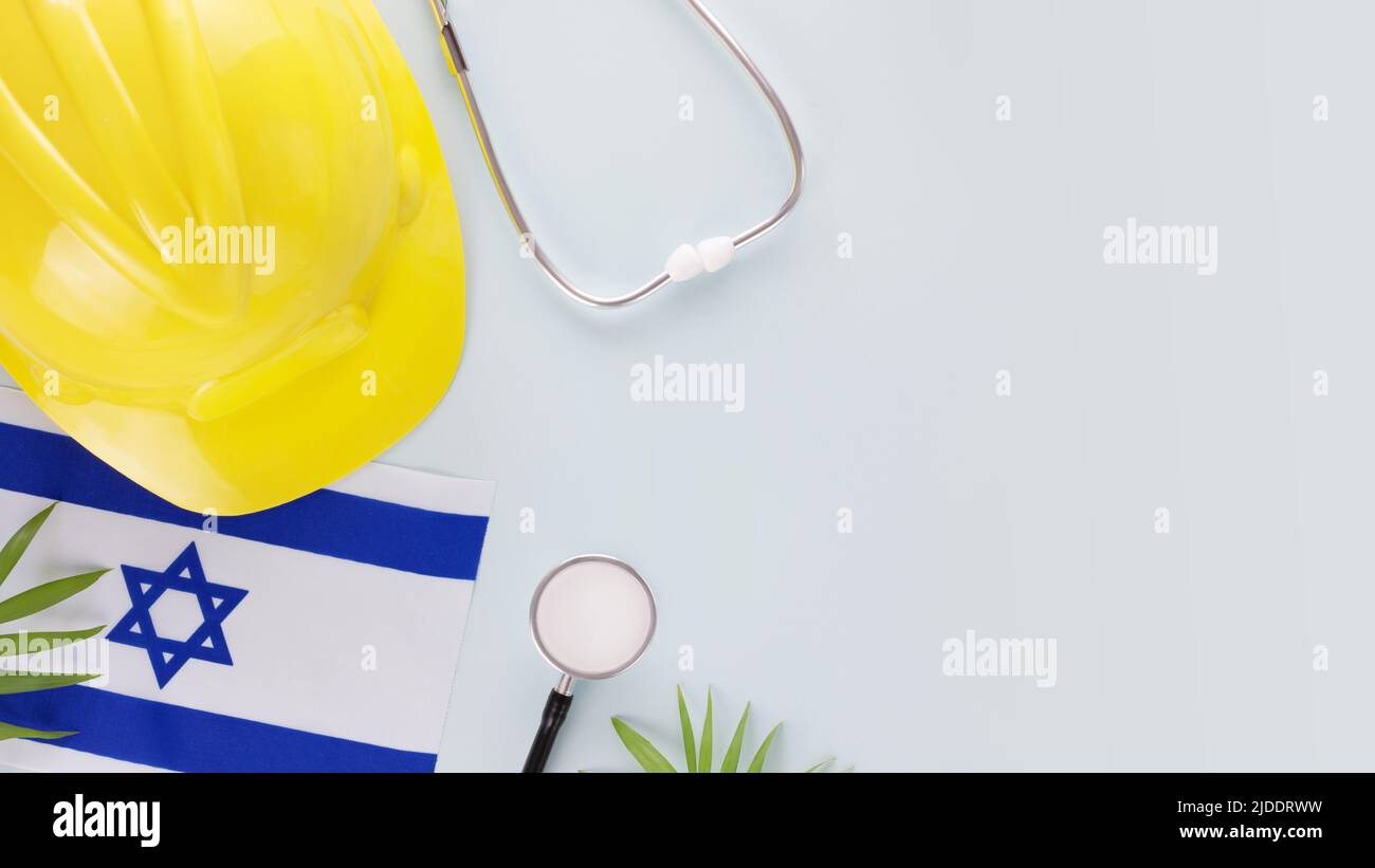 Medical care and insurance of workers in Israel. Israeli flag ...