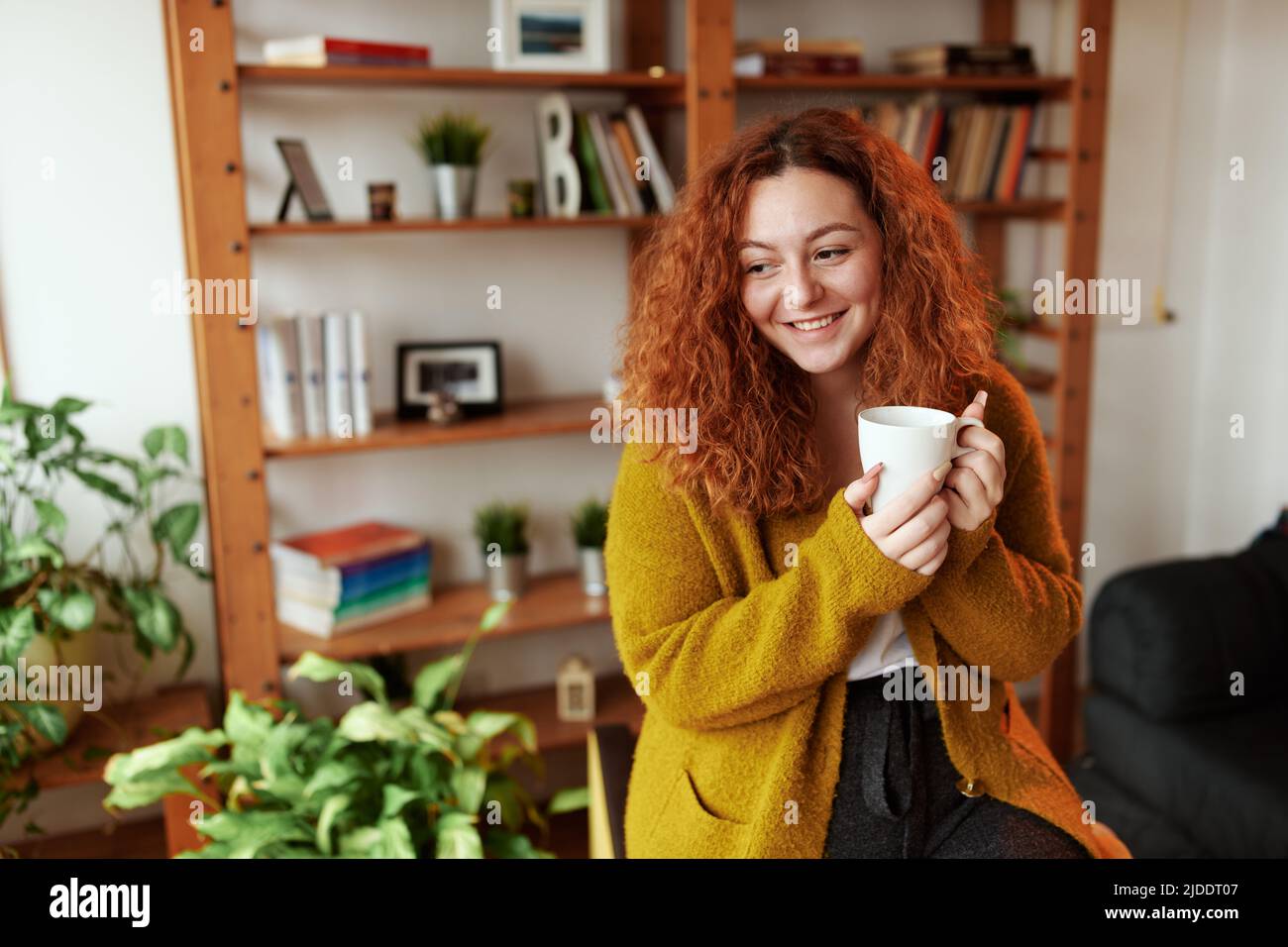 A Redhead Girl Enjoying Morning Coffee At Home A Happy Redhead Girl 8694