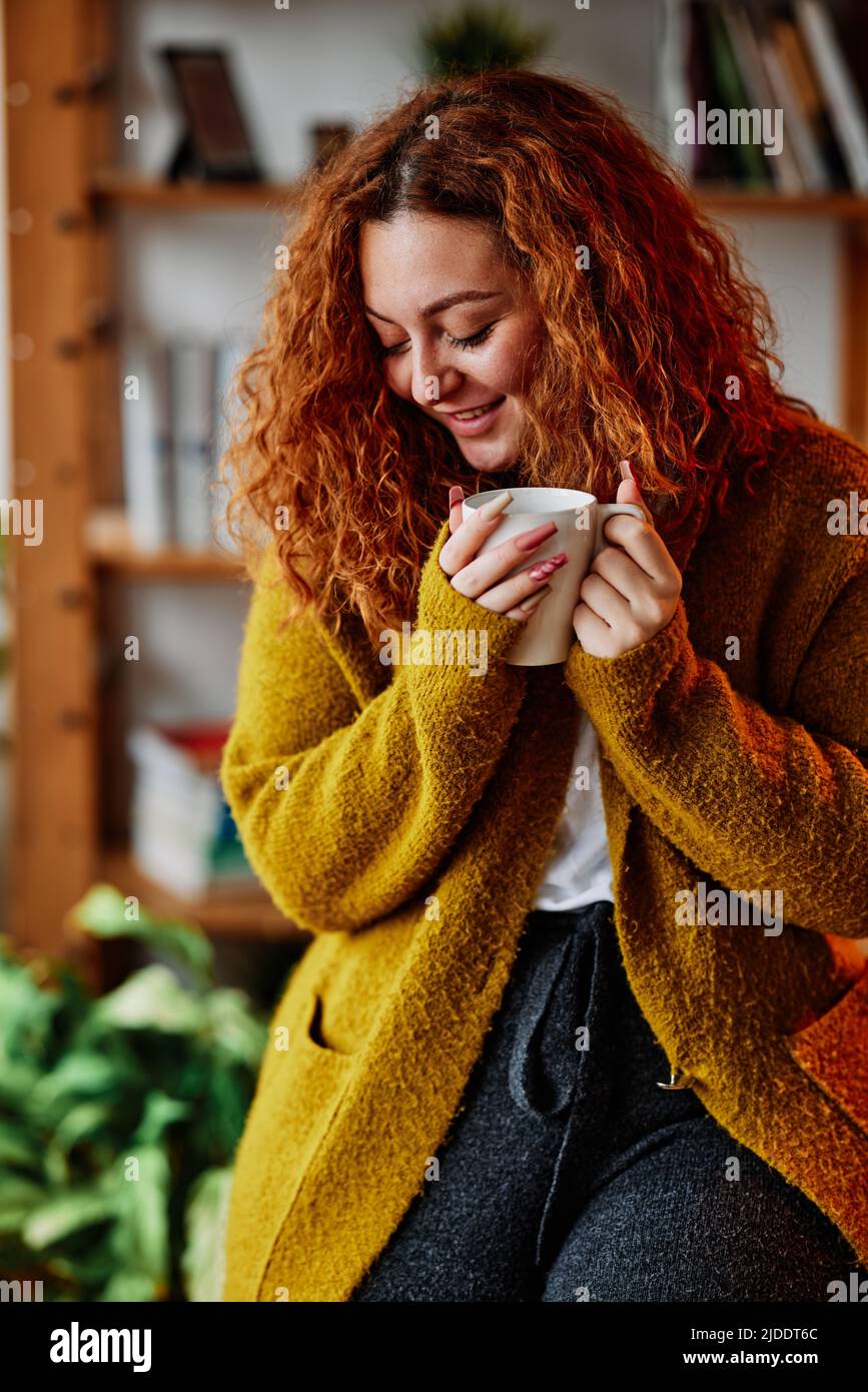 A Redhead Girl Enjoying Morning Coffee At Home A Happy Redhead Girl 7113