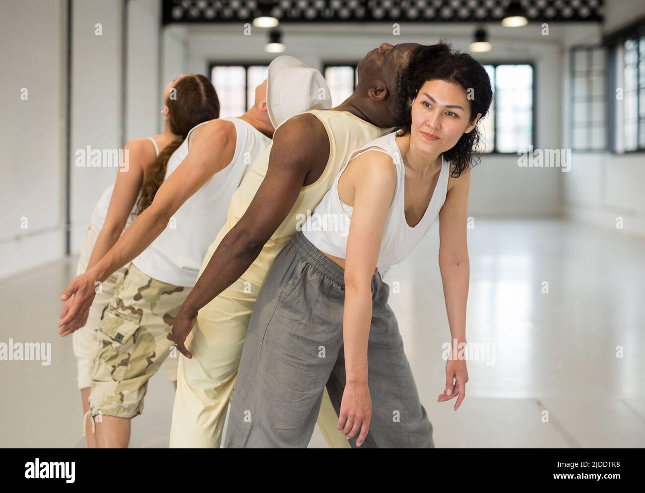 Group of artists demonstrating art performance Stock Photo - Alamy