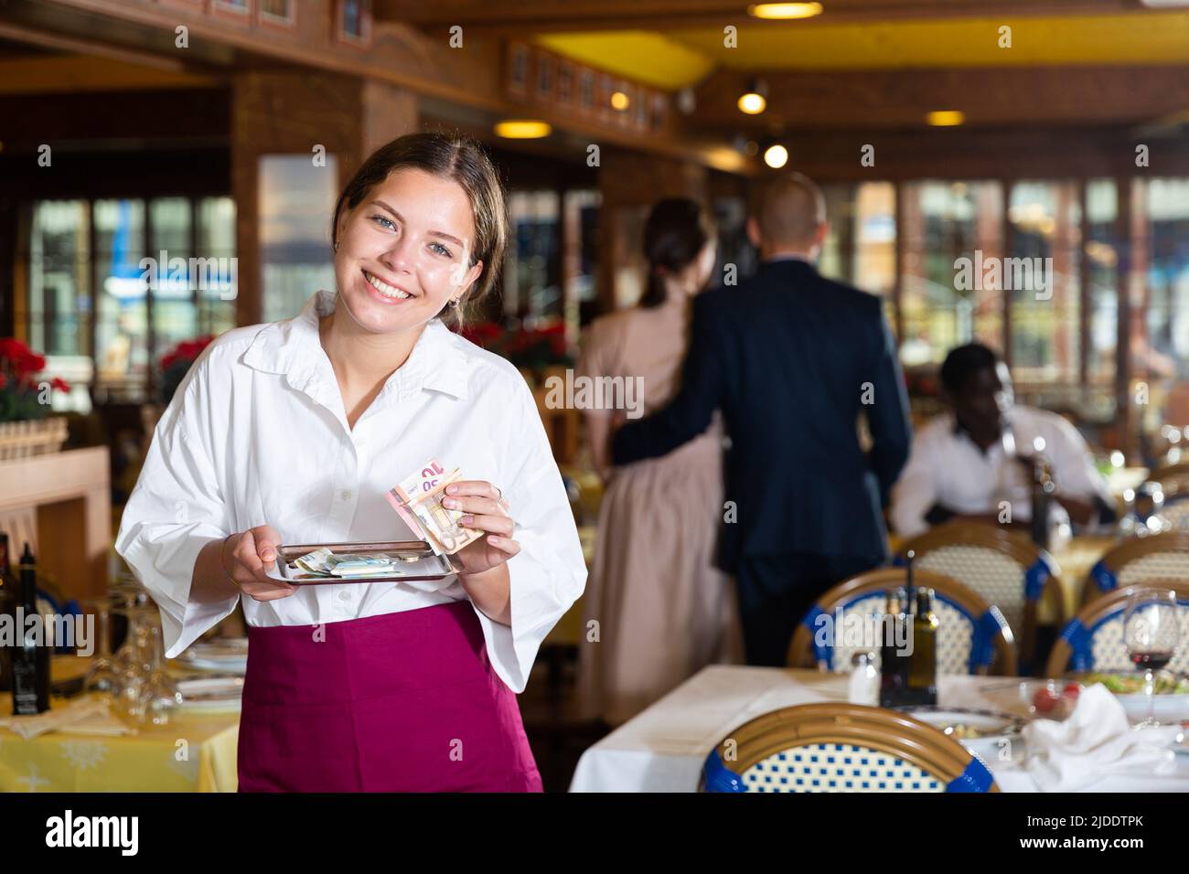 Woman waiter tip hi-res stock photography and images - Alamy