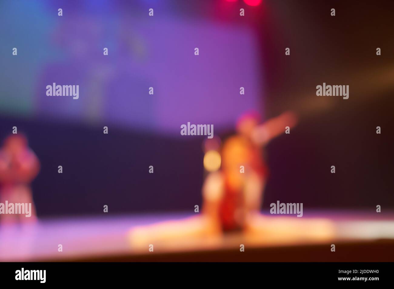 Silhouettes of small dancers with elements of gymnastic dance. Colored ...