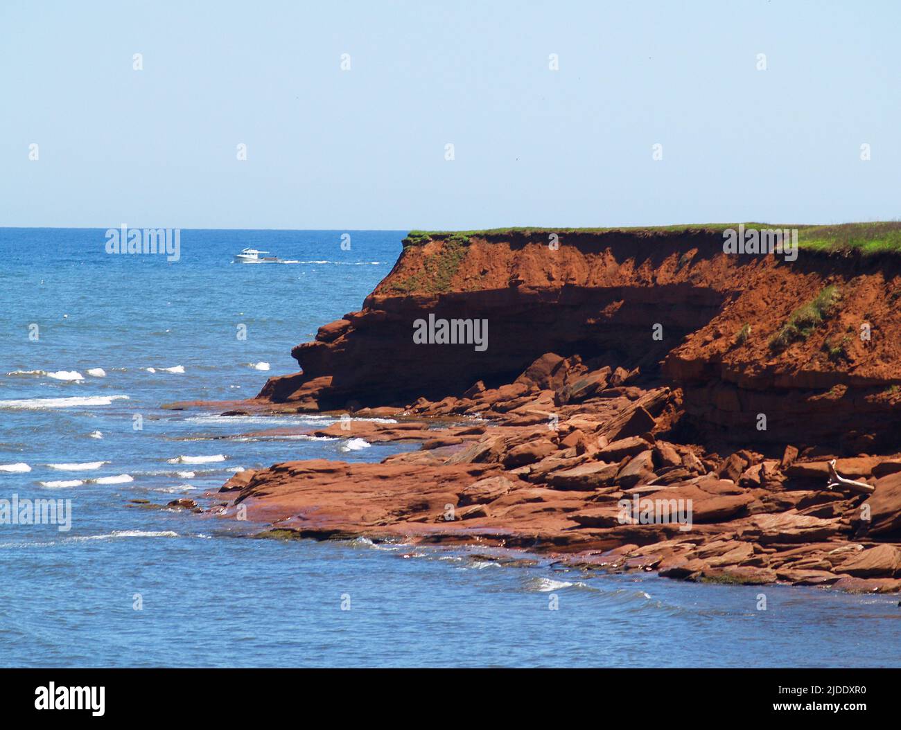 Red sandstone cliffs of Prince Edward Island National Park Stock Photo ...