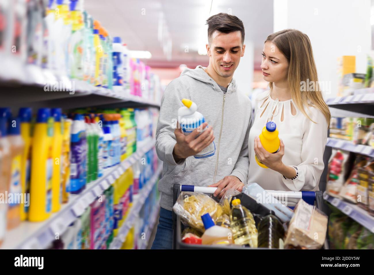 Woman customer buying detergents hi-res stock photography and images ...