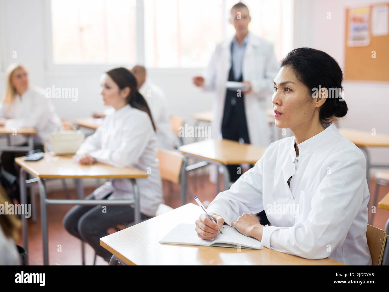 Group of medical academy students at lesson Stock Photo - Alamy