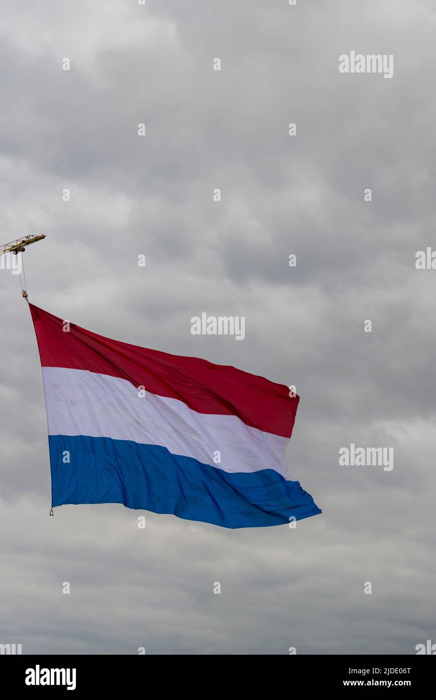 Dutch flag hoisted on a national holiday Stock Photo - Alamy