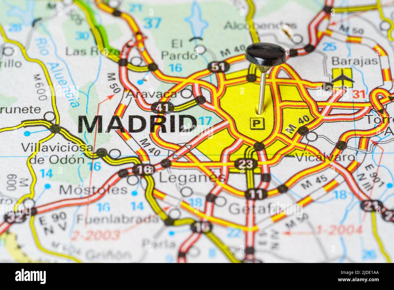 Tourist destination of Madrid marked with a pin on a map, macro photo ...