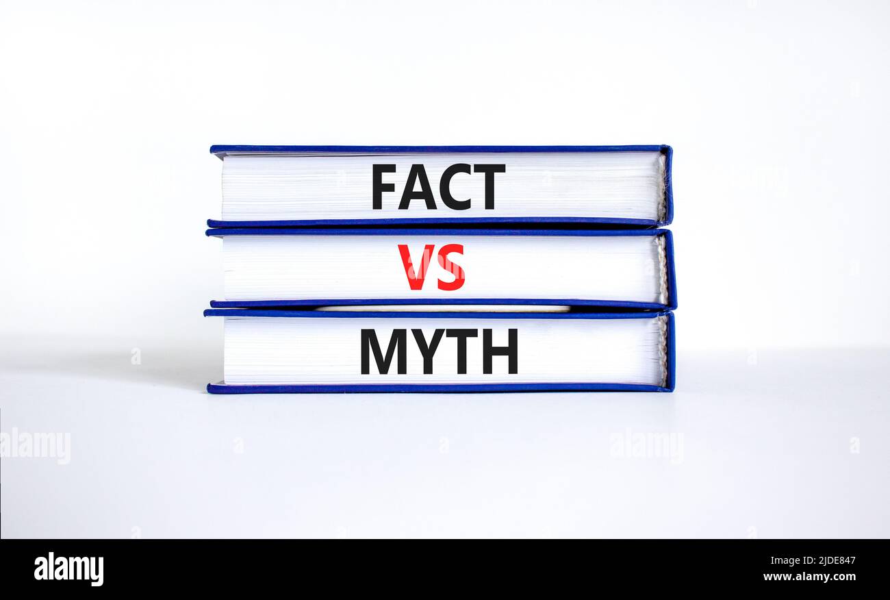 Fact vs myth symbol. Concept words Fact vs myth on books on a beautiful ...