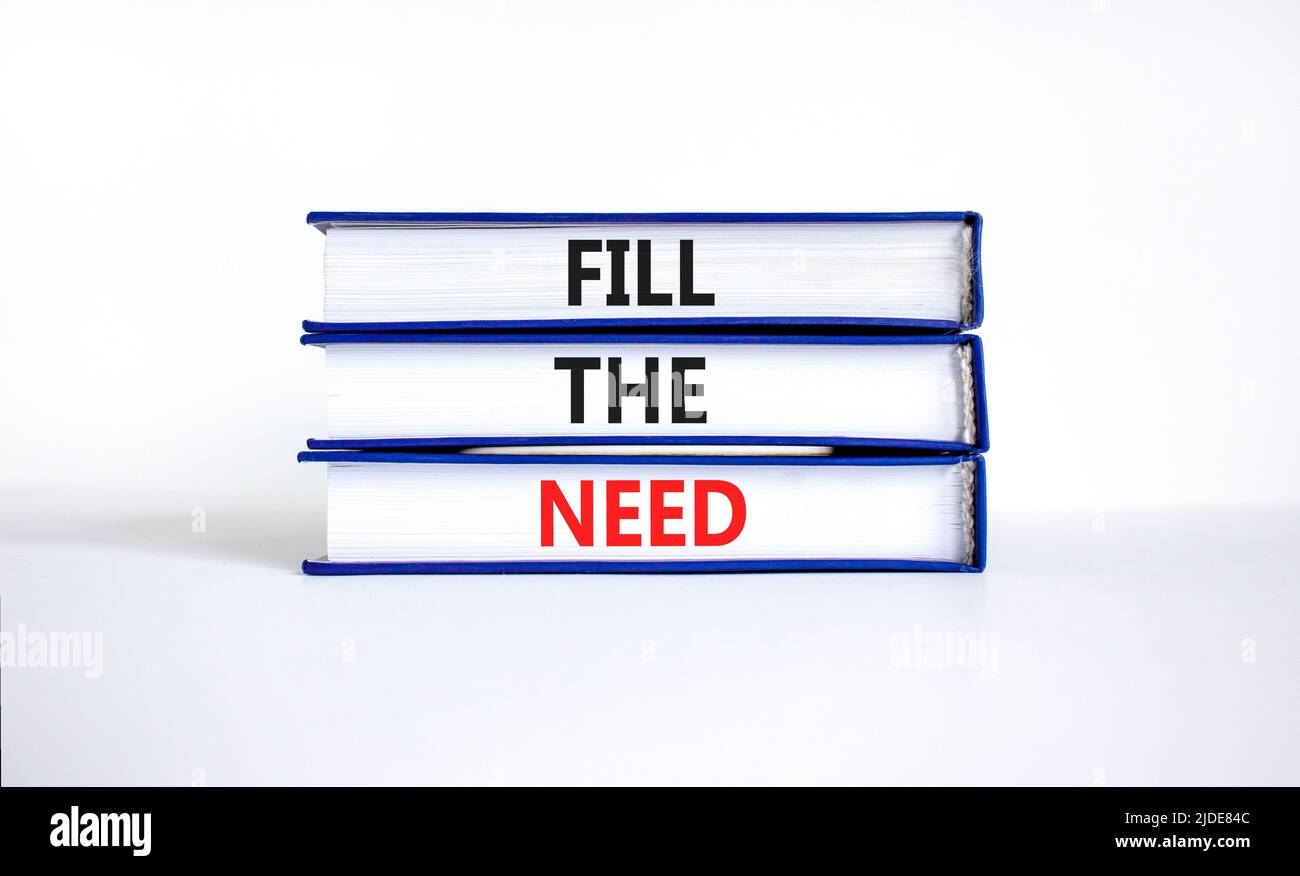 Fill the need symbol. Concept words Fill the need on books on a ...