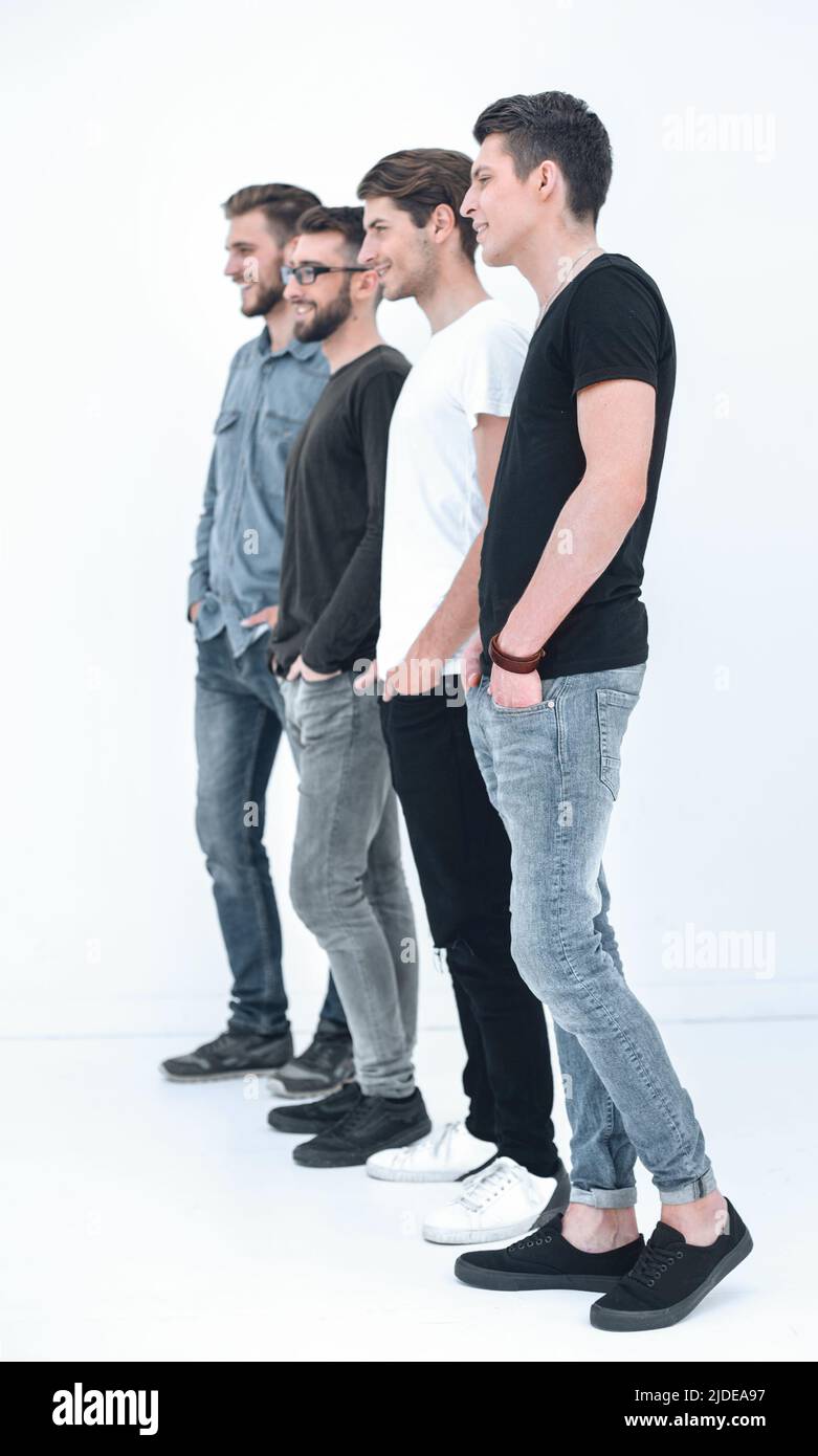 Group of people smiling at the office lined up Stock Photo - Alamy