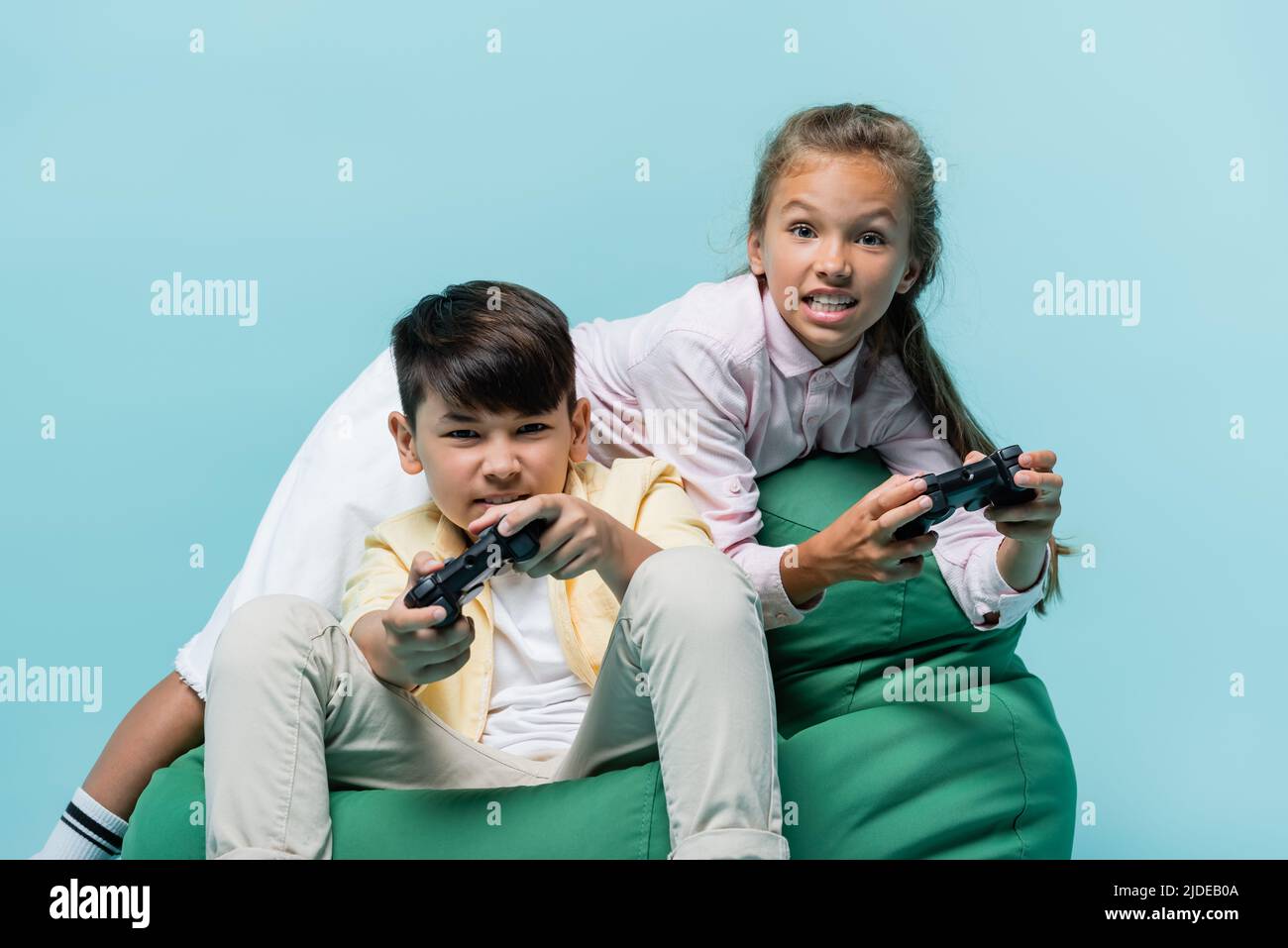 Asian kids playing video game hi-res stock photography and images - Alamy