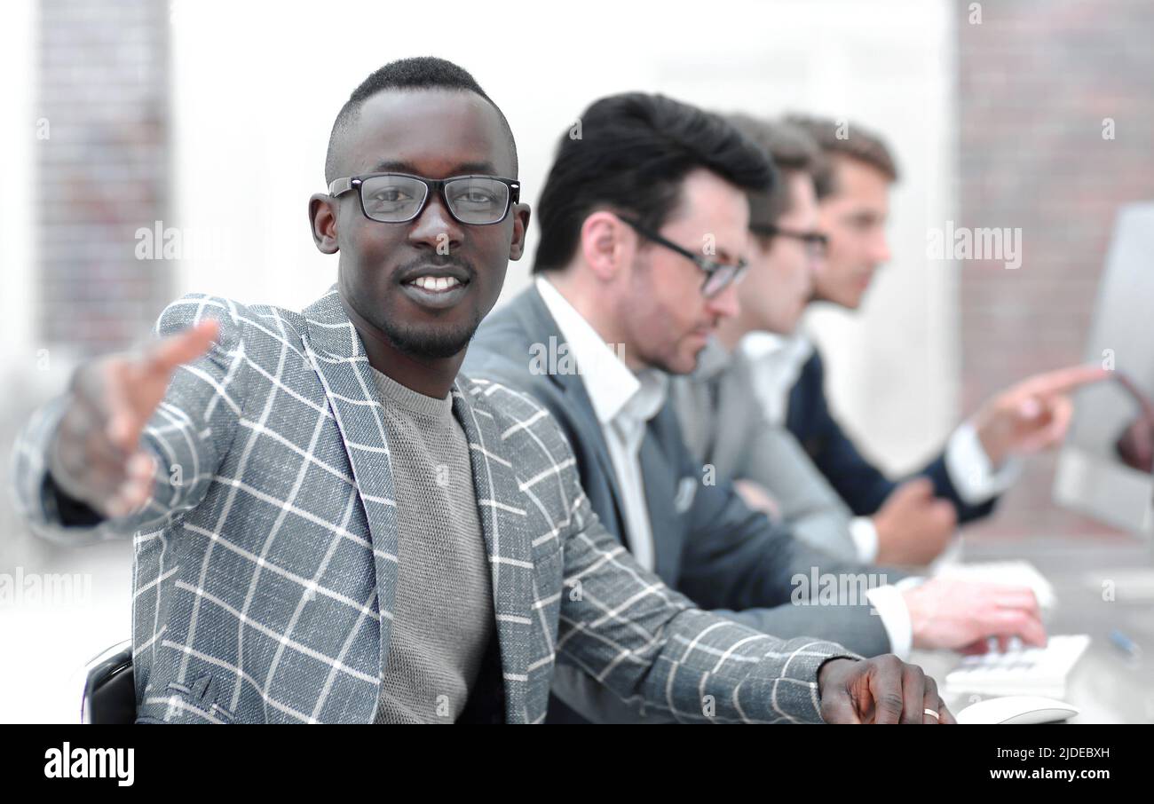 young businessman reaching out for a handshake Stock Photo - Alamy