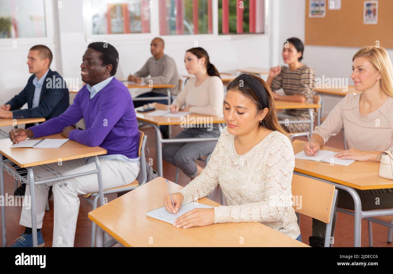 Young woman working during group business training Stock Photo - Alamy