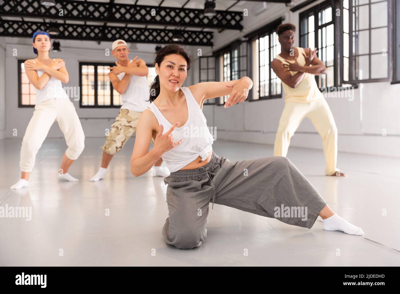 Team of dancers performing hip-hop dance Stock Photo - Alamy