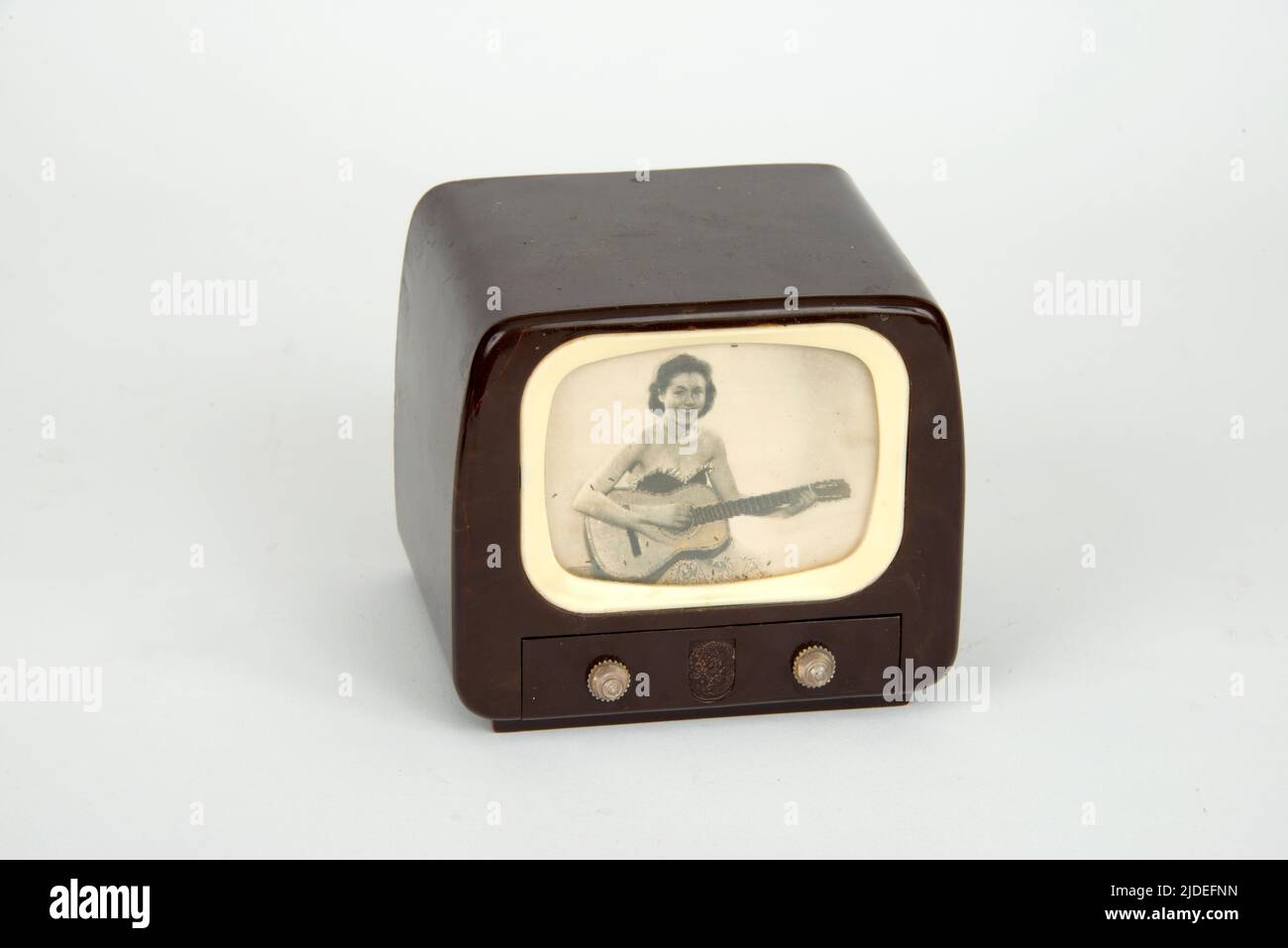 A selection of bakelite and plastic items. Novelty musical box in the ...