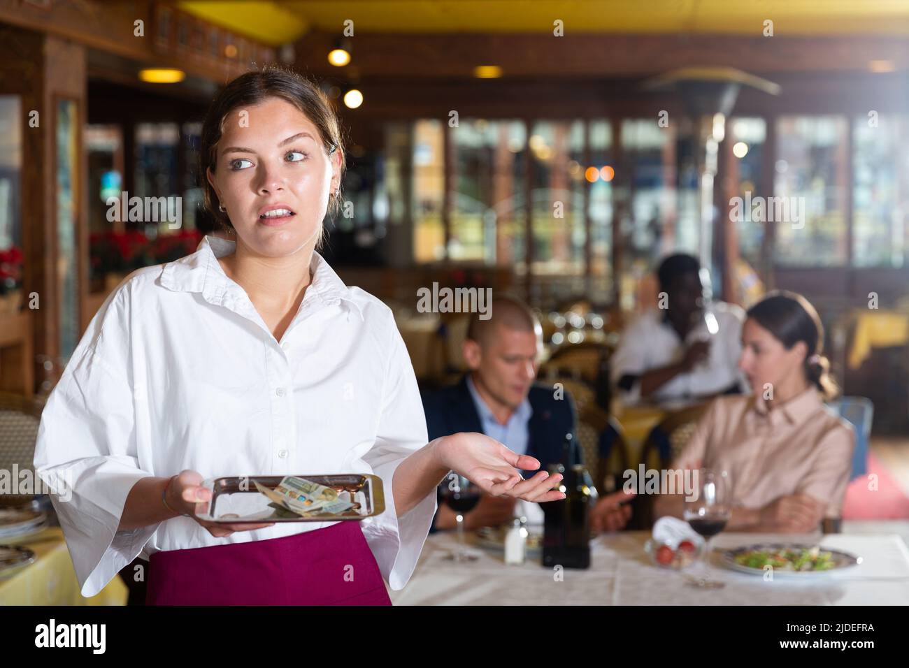 Complaining woman waiter hi-res stock photography and images - Alamy
