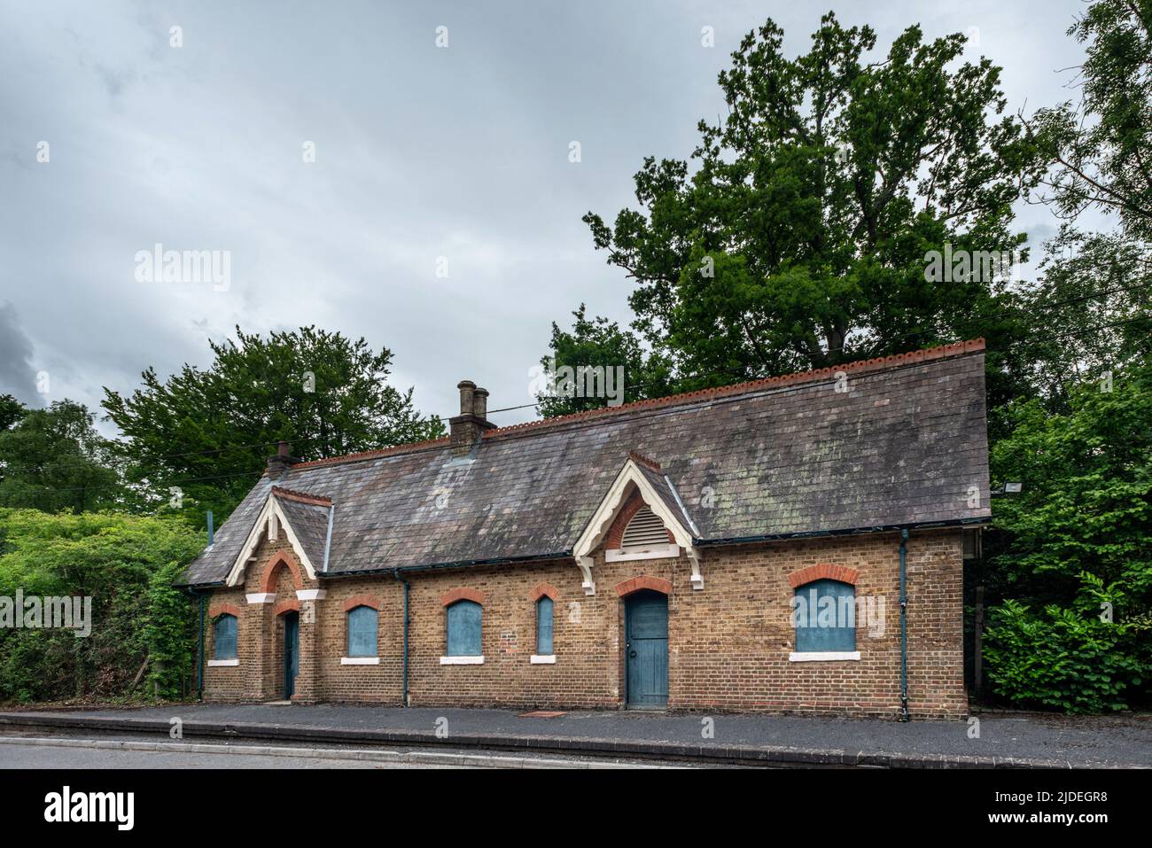 East Grinstead, June 9th 2022: The abandoned railway station at Rowfant ...