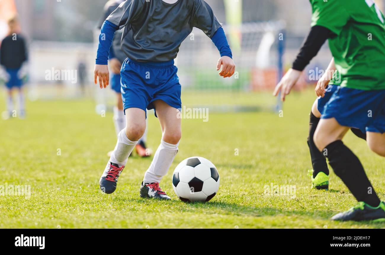 Little Boys Playing Soccer Tournament Match Outfoor. Football Game on ...