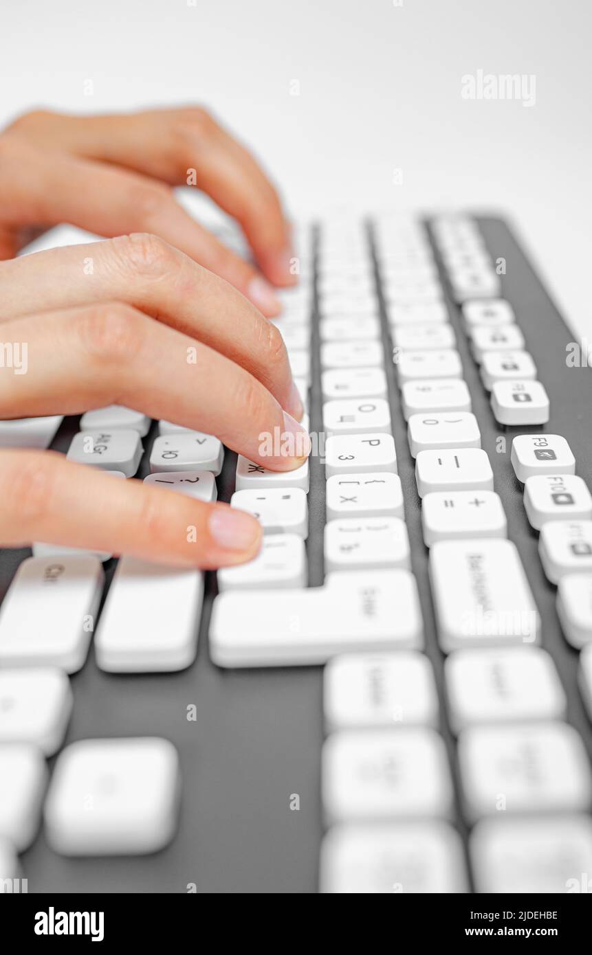 Female typing information on white hi-res stock photography and images ...