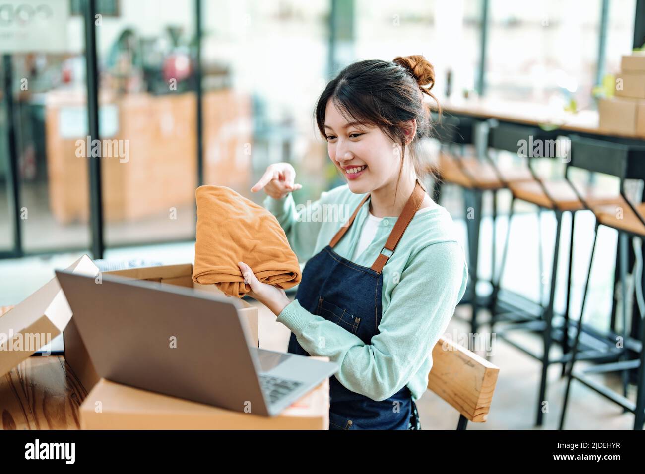 Portrait of a small startup business, SME owner, Asian female ...