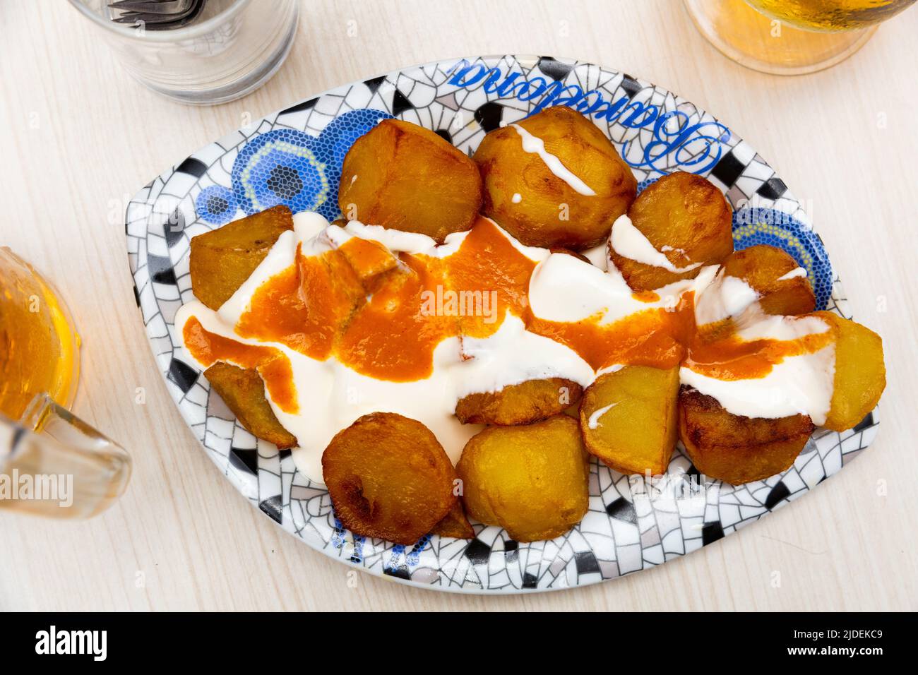 Potatoes with sauce, Spanish dish Patatas bravas Stock Photo - Alamy