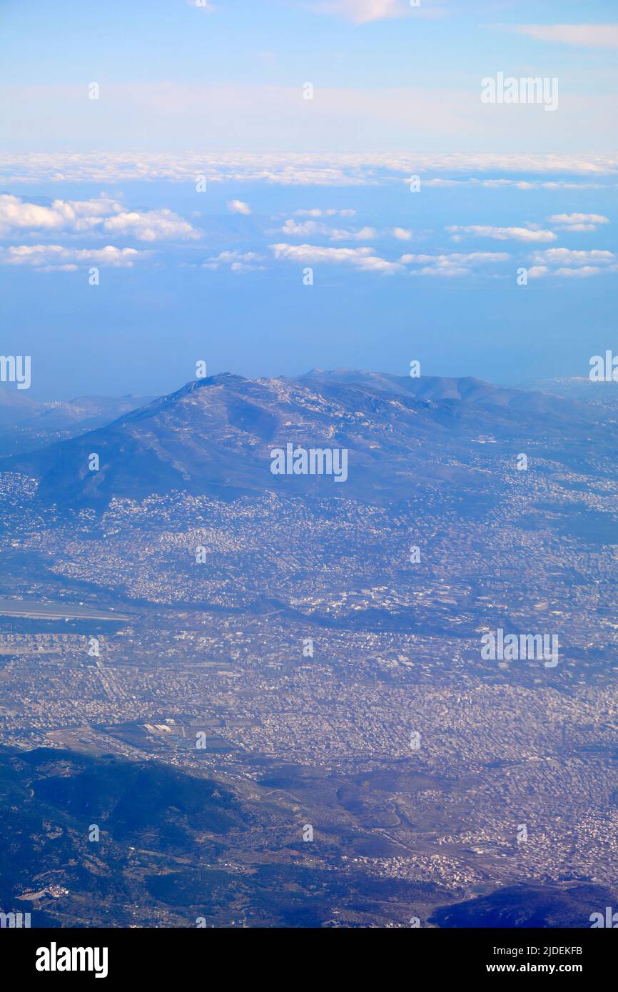 Aerial view of parts of Athens and surrounding mountains, during ...