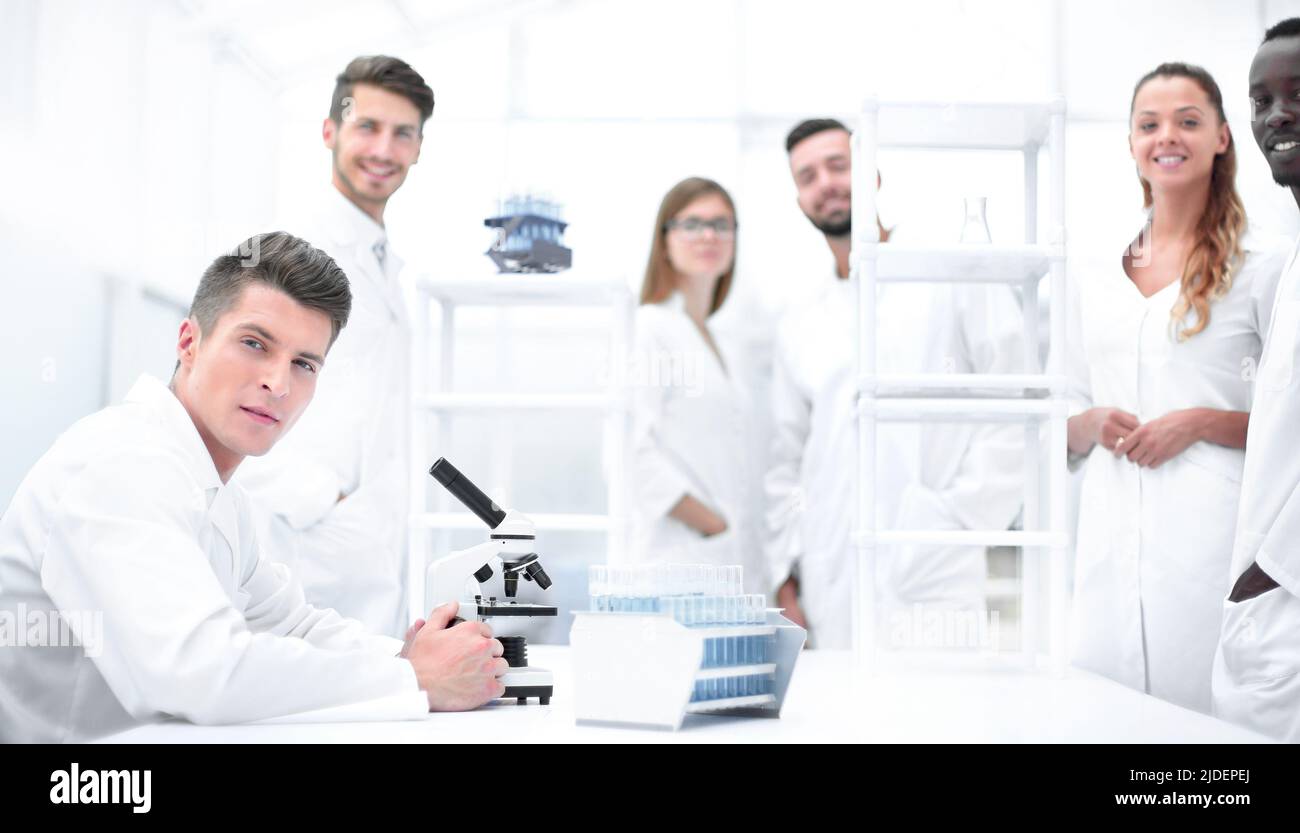 Male Scientist Working With Microscope Stock Photo - Alamy
