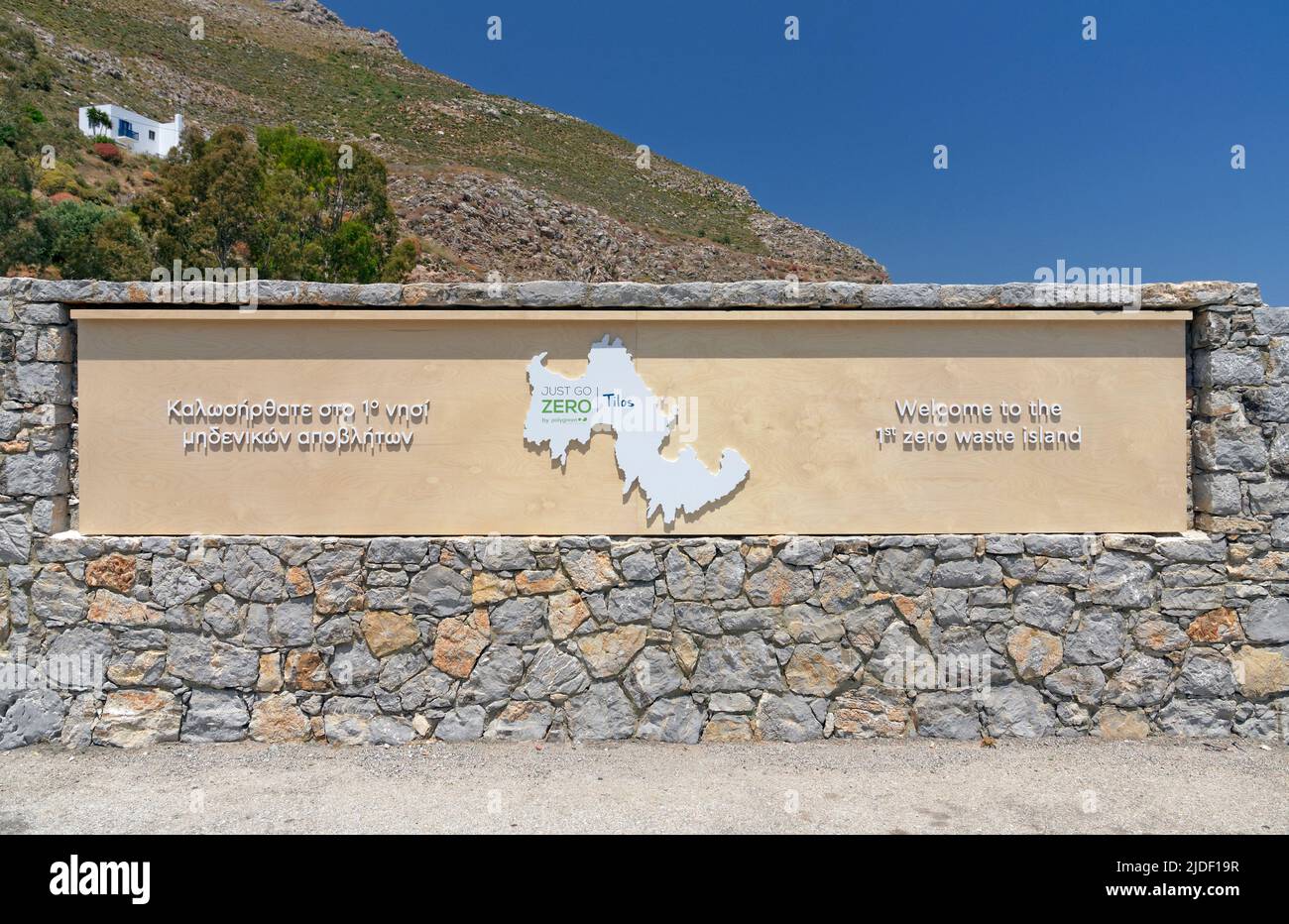 Just Go Zero signage on the harbour side,Tilos, New Zero Waste ...