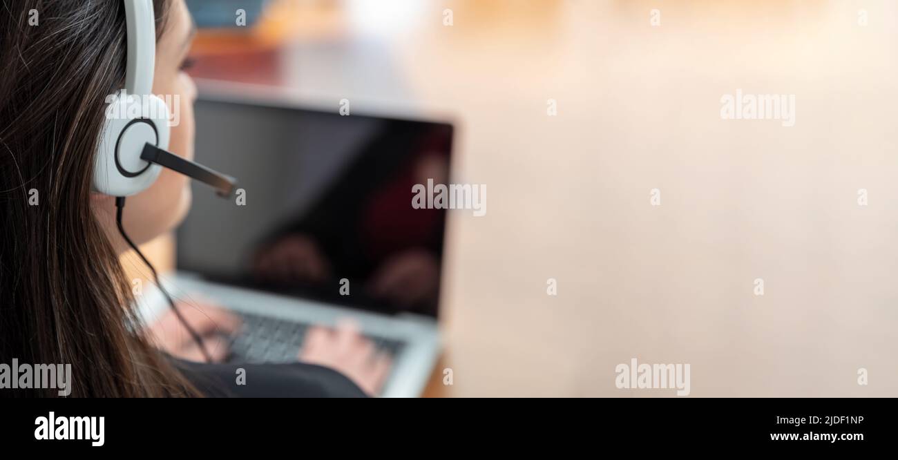 Woman headset rear view hi-res stock photography and images - Alamy
