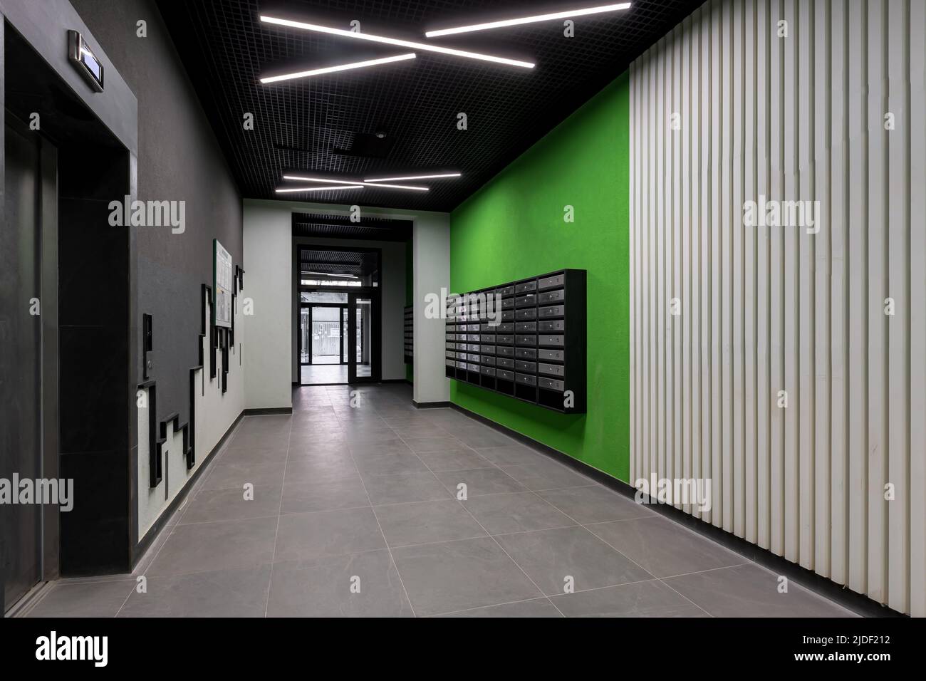 Corridor hall interior, with front door and elevator in many apartment ...