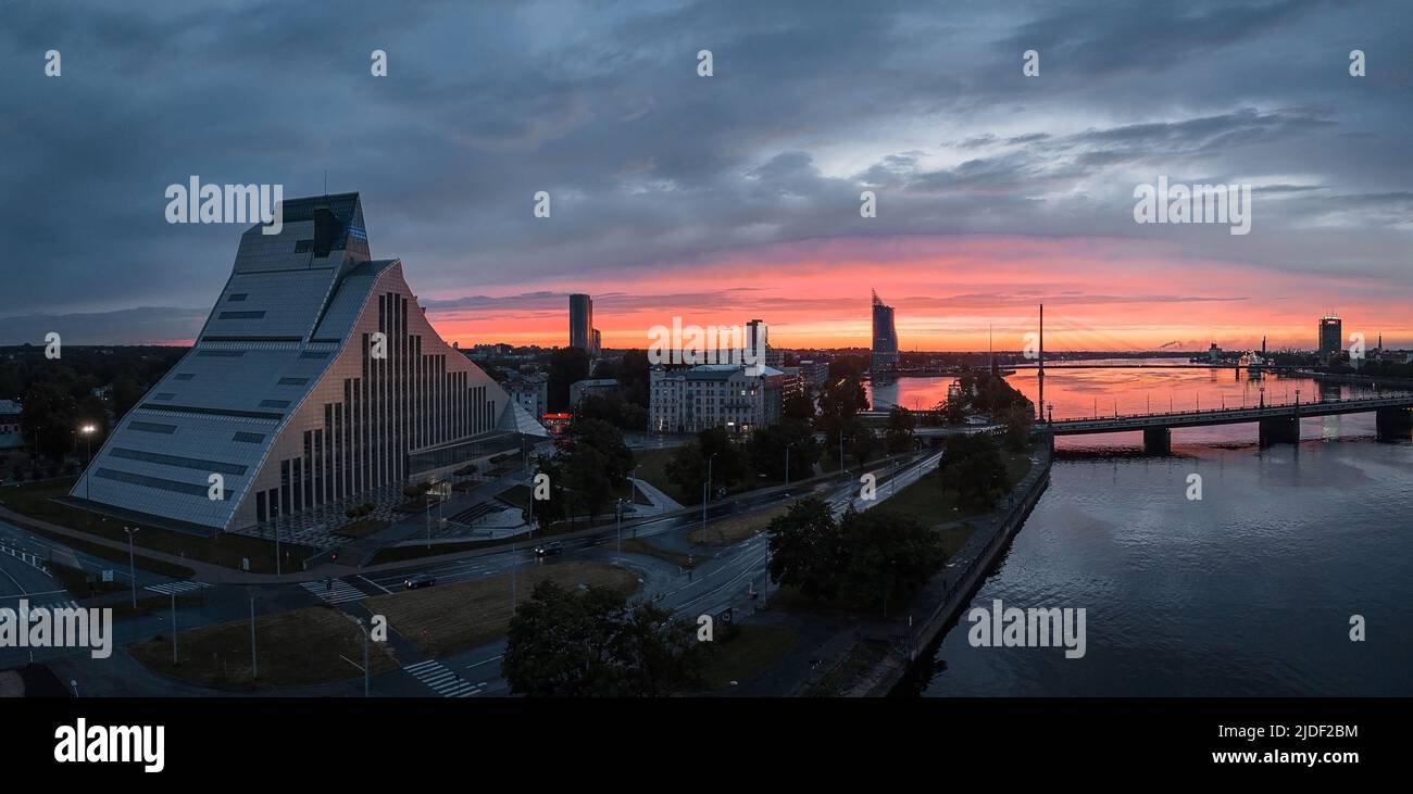 Panoramic view of Latvian National Library in Riga during epic evening ...