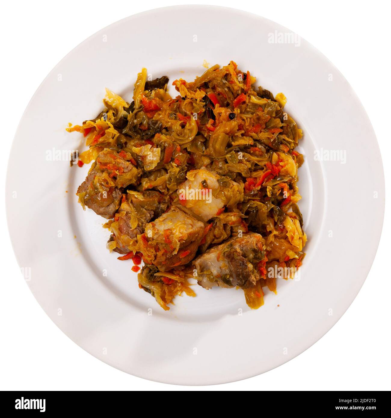 Just cooked portion of pork meat stewed with cabbage Stock Photo - Alamy