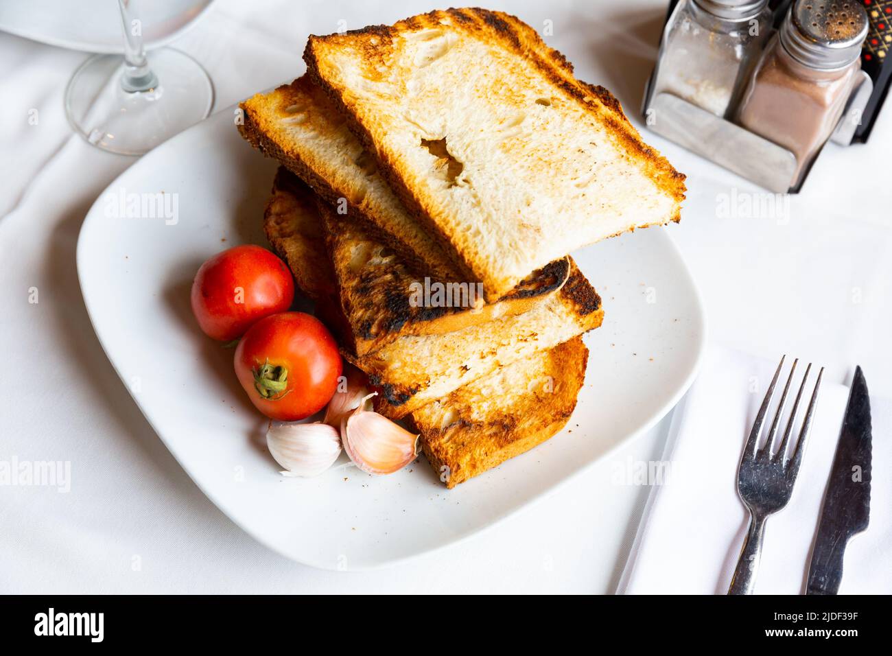 Kitchen table with cooking tools and fresh vegetables. Pan Con tomate ...