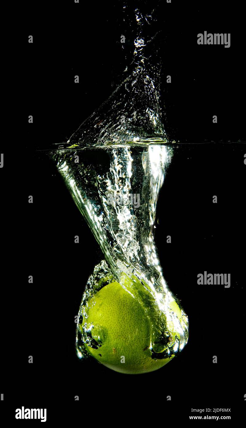 Lime Water Splash Stock Photo - Alamy