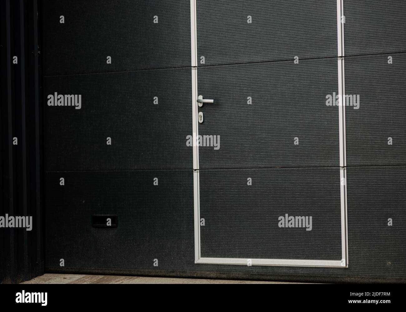 Factory or warehouse building. storage room door Stock Photo - Alamy