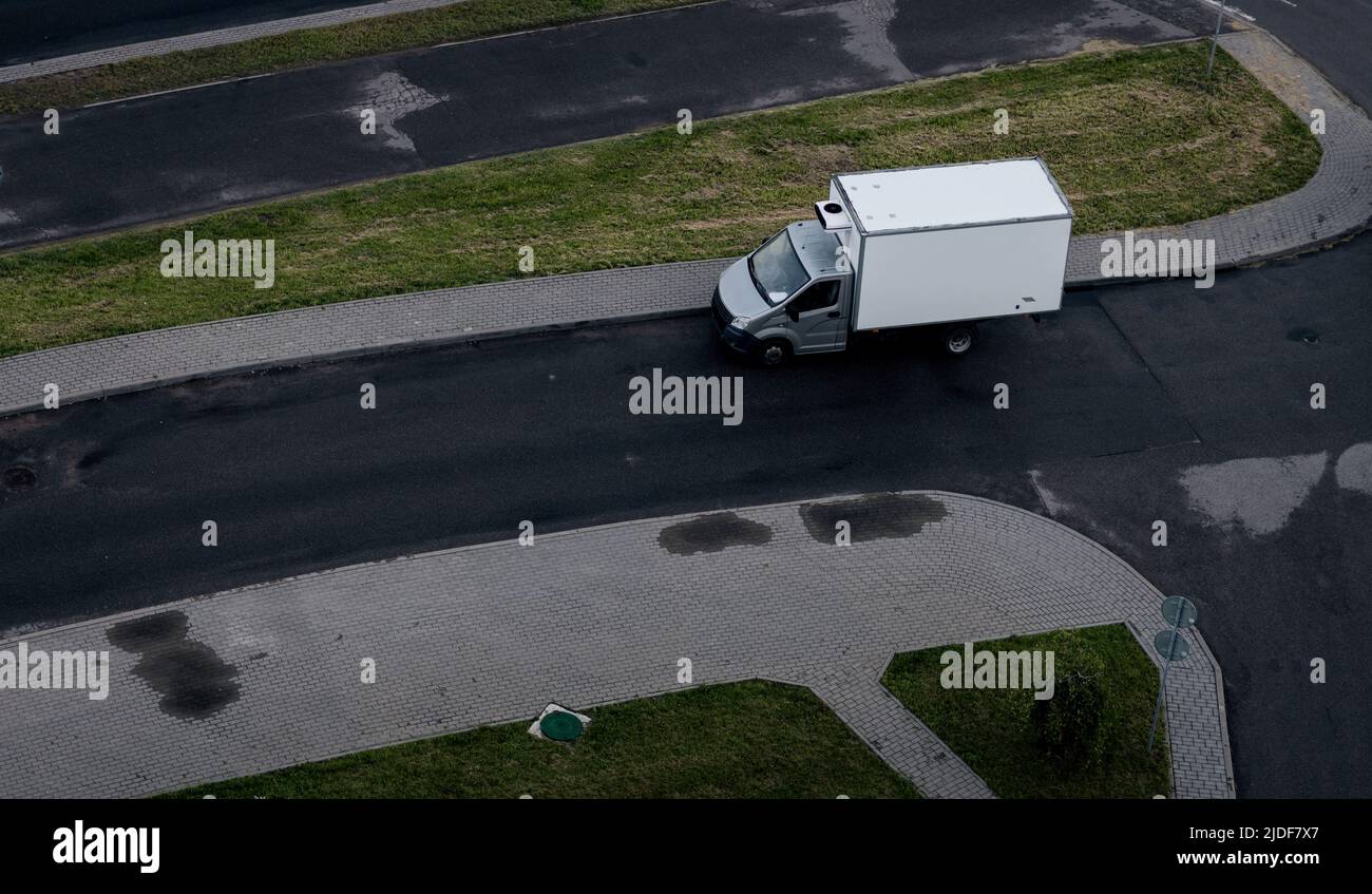 truck with empty mock up banner on a van. Cargo delivery truck. aerial ...