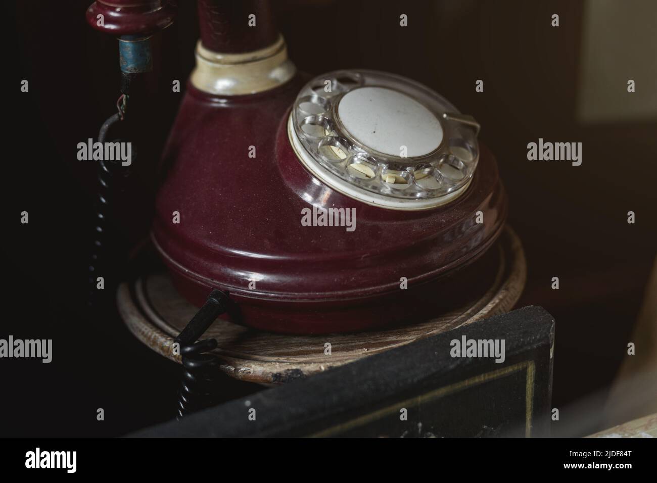 Old dust-covered phone with disk dialing. retro telephone Stock Photo ...