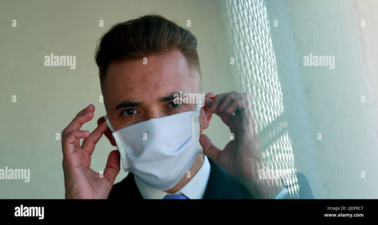 Man removing covid-19 face mask after pandemic, person feeling relief ...