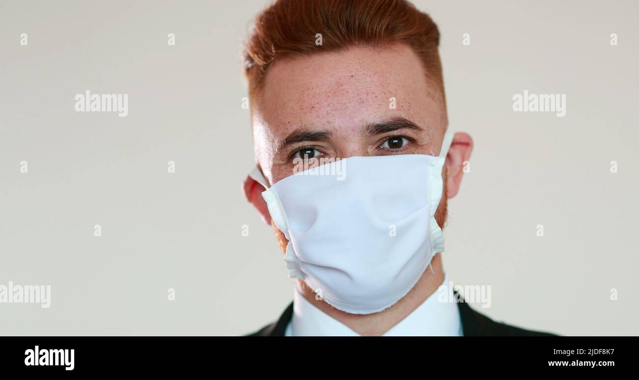 Person removing face mask after pandemic, man feeling relief Stock ...