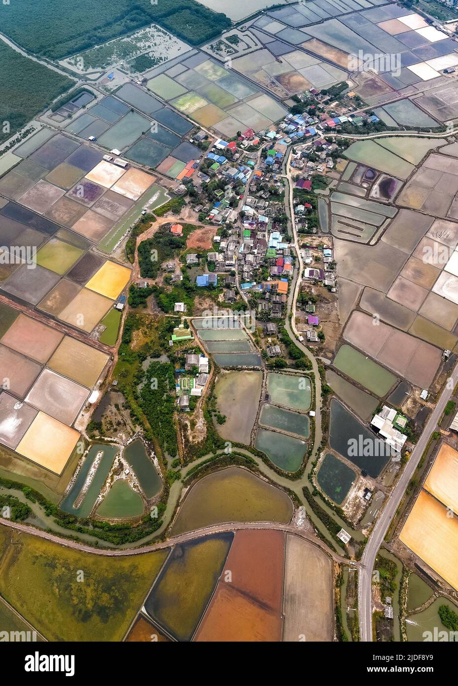 Aerial view of Salt Farms in the village of Laem Phak Bia in ...