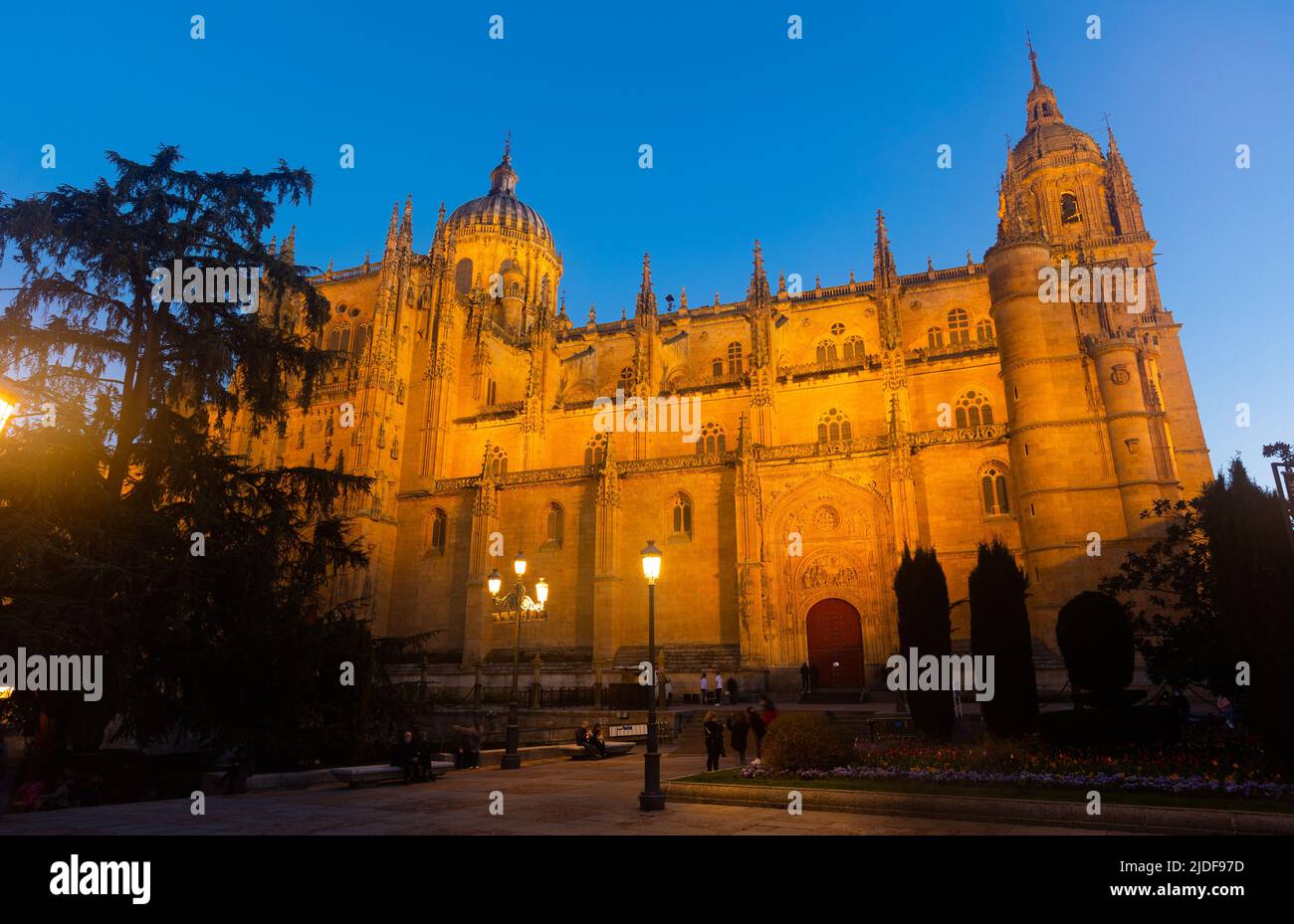 Illuminated building of New Cathedral of Salamanca in spring twilight ...
