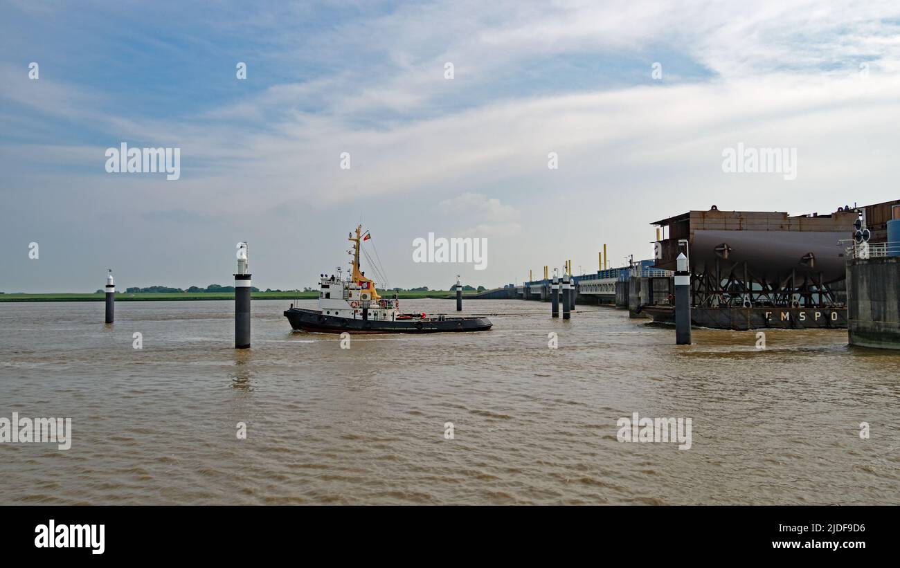 Gandersum, Lower Saxony, Germany - 19 June 2021: Tugboat "Ems Pull" and ...