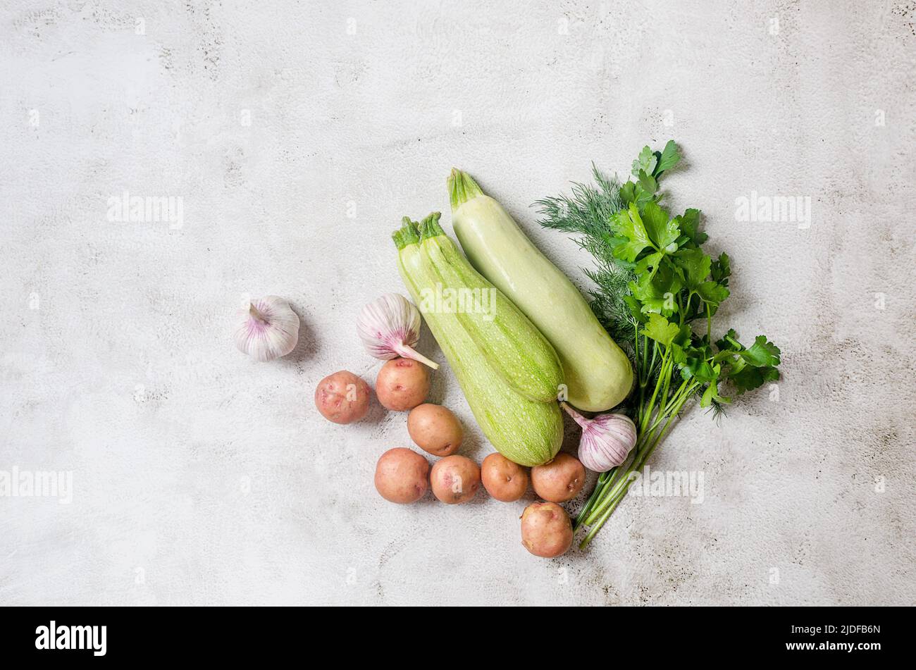 Fresh seasonal summer vegetables, marrow, potatoes, garlic and other ...