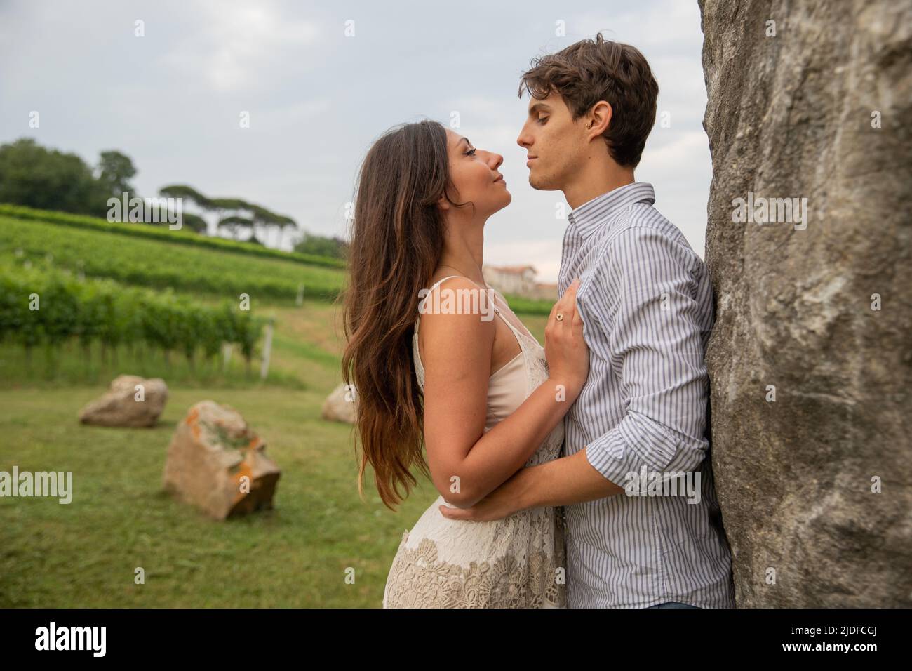 Beautiful Young Couple Embracing Each Other Look Into Each Others Eyes