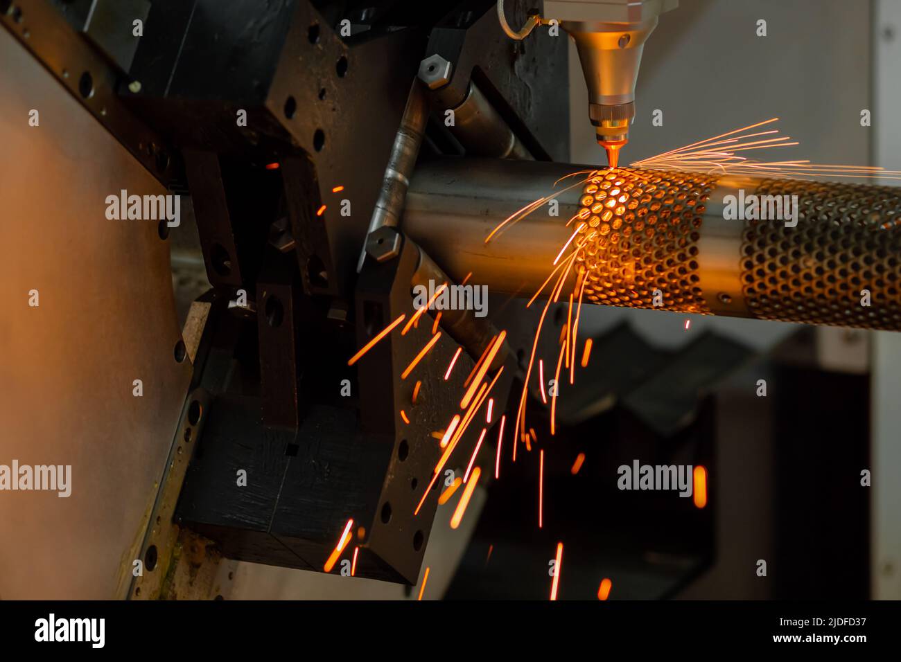 Laser cutting machine working with metal workpiece with sparks Stock ...