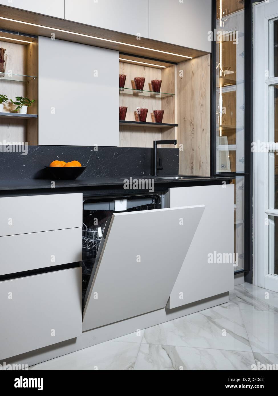 Promotional photograph of a kitchen using flash Stock Photo - Alamy